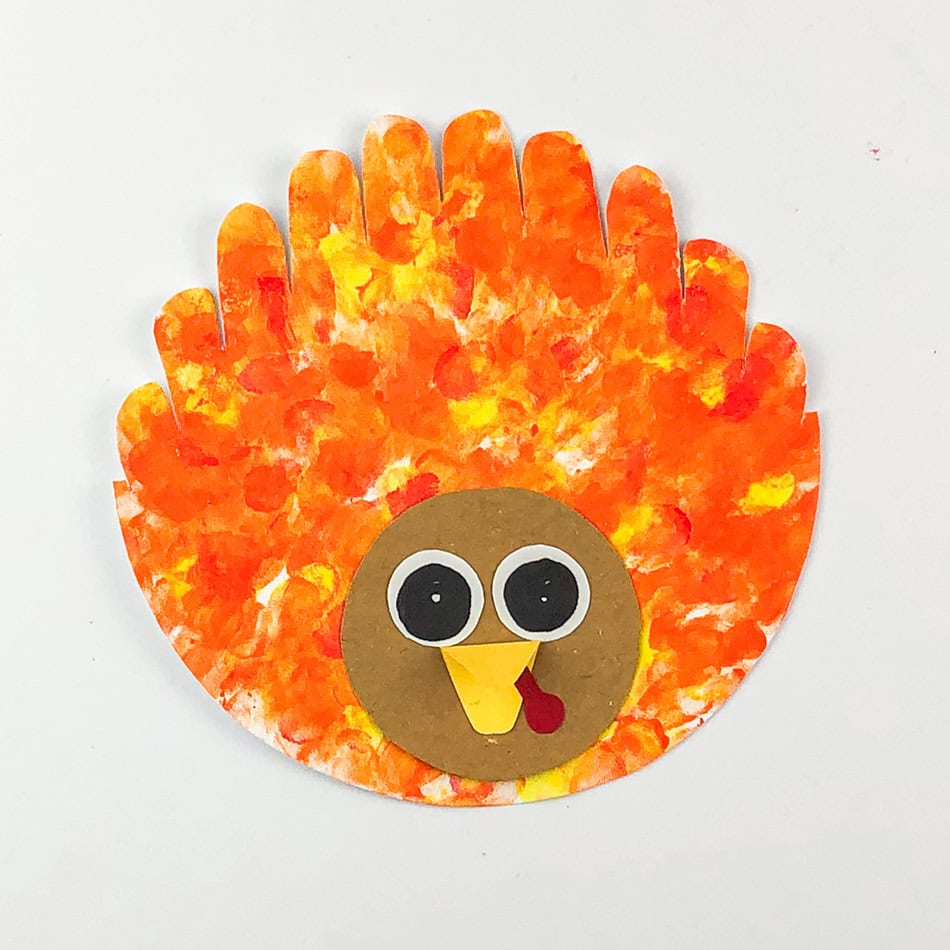Fun finger-painted Turkey Thanksgiving Craft for Preschoolers & Toddlers