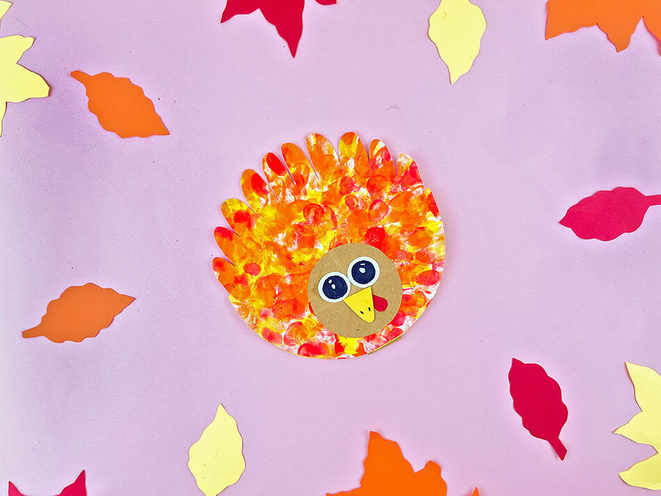 Fun finger-painted Turkey Thanksgiving Craft for Preschoolers & Toddlers