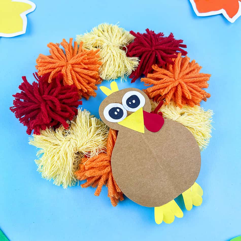 DIY Adorable Yarn Wreath Thanksgiving Turkey Craft for Kids (+ Template)