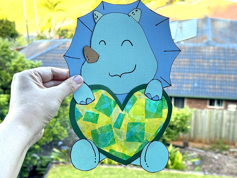 DIY Valentine Triceratops Dinosaur Suncatcher Craft for Kids